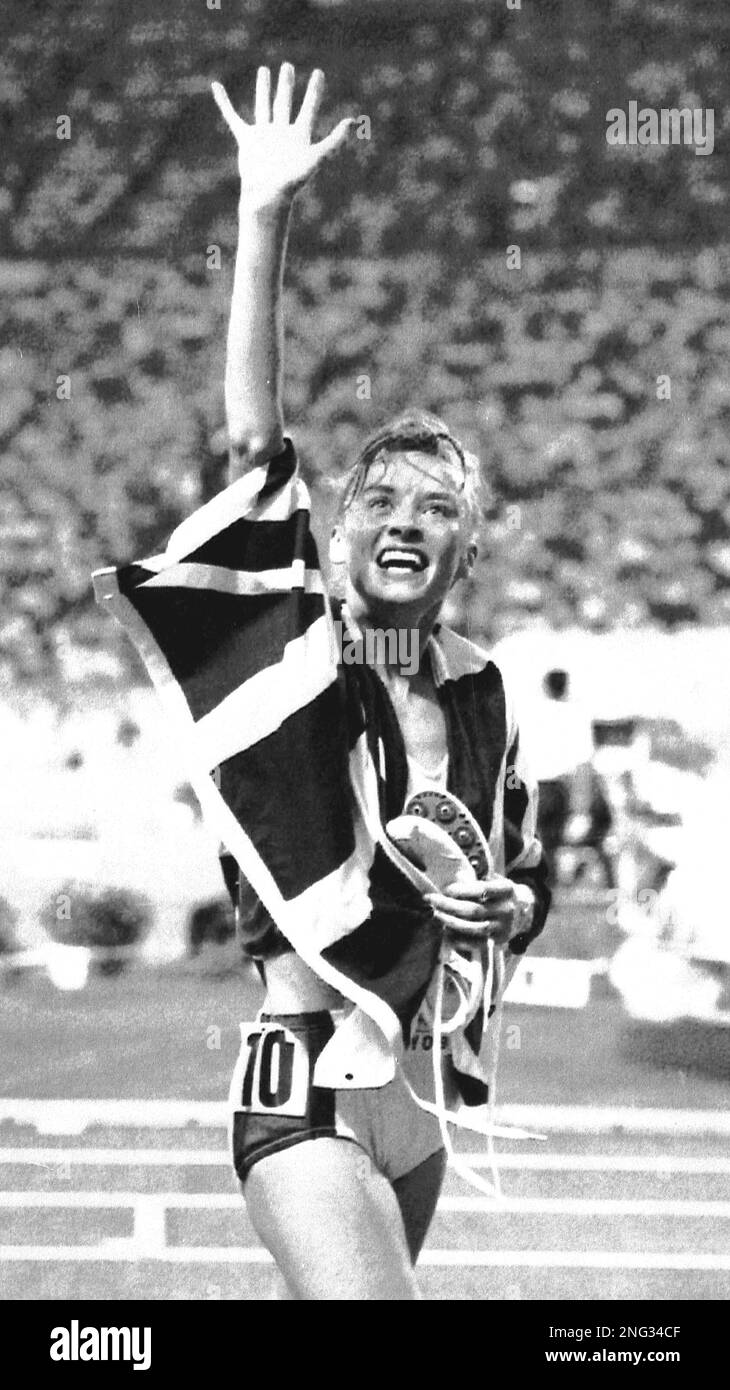 British athlete Liz McColgan waves to the crowd after winning the women ...