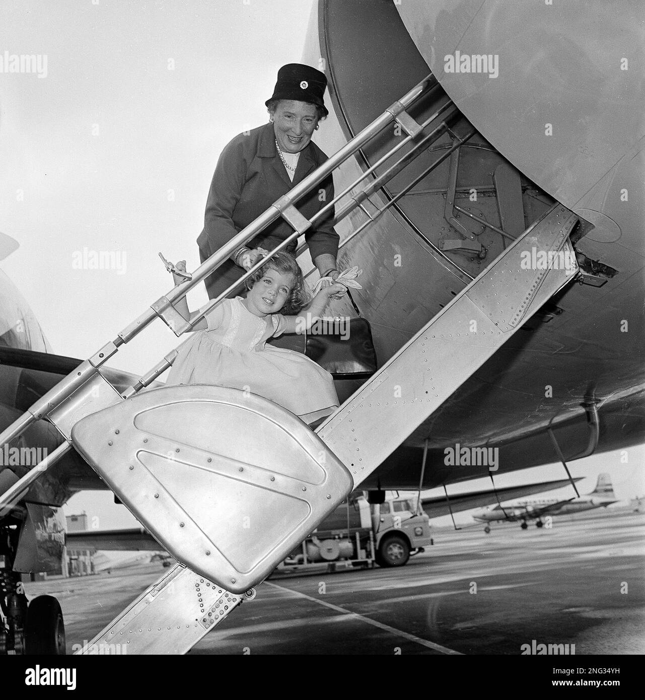 Caroline Kennedy peeks through the stair ramp as she and her nurse ...