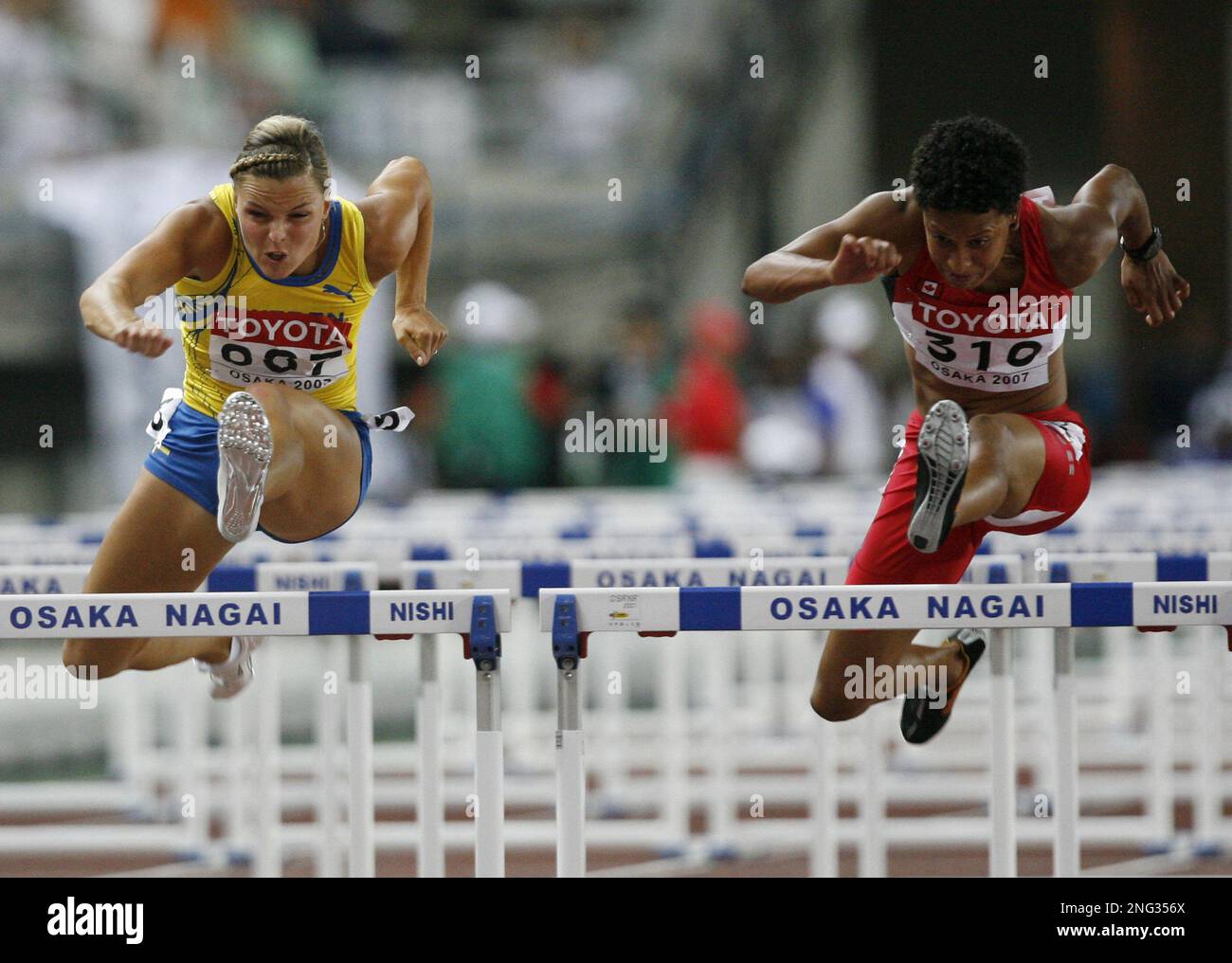 Sweden's Susanna Kallur, left, and Canada's Angela Whyte compete in ...