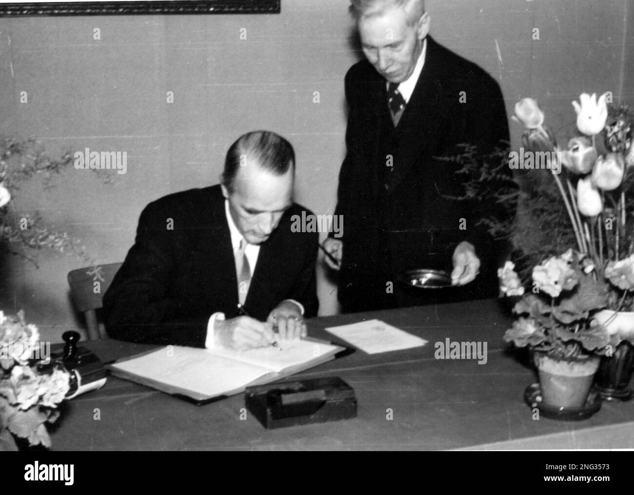 Alfried Krupp von Bohlen und Halbach, signs the wedding register in the ...