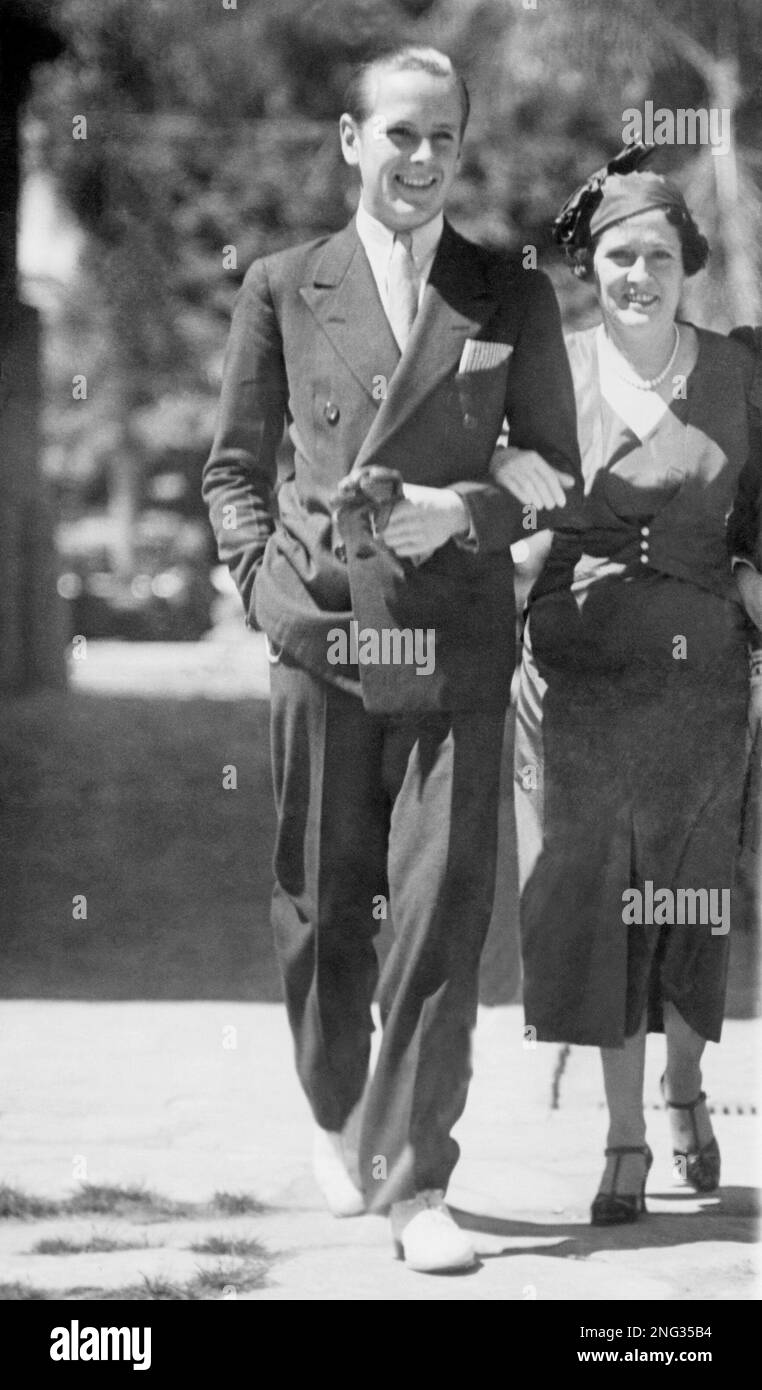 Jesse Livermore, Jr, 15 is shown here with his mother, Mrs. Dorothea ...