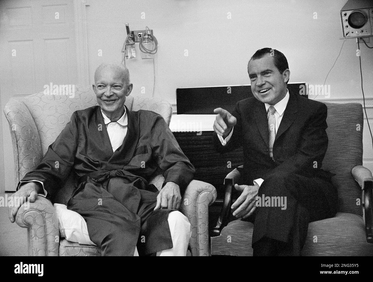 President Richard Nixon, right, points out newsmen who covered the ...