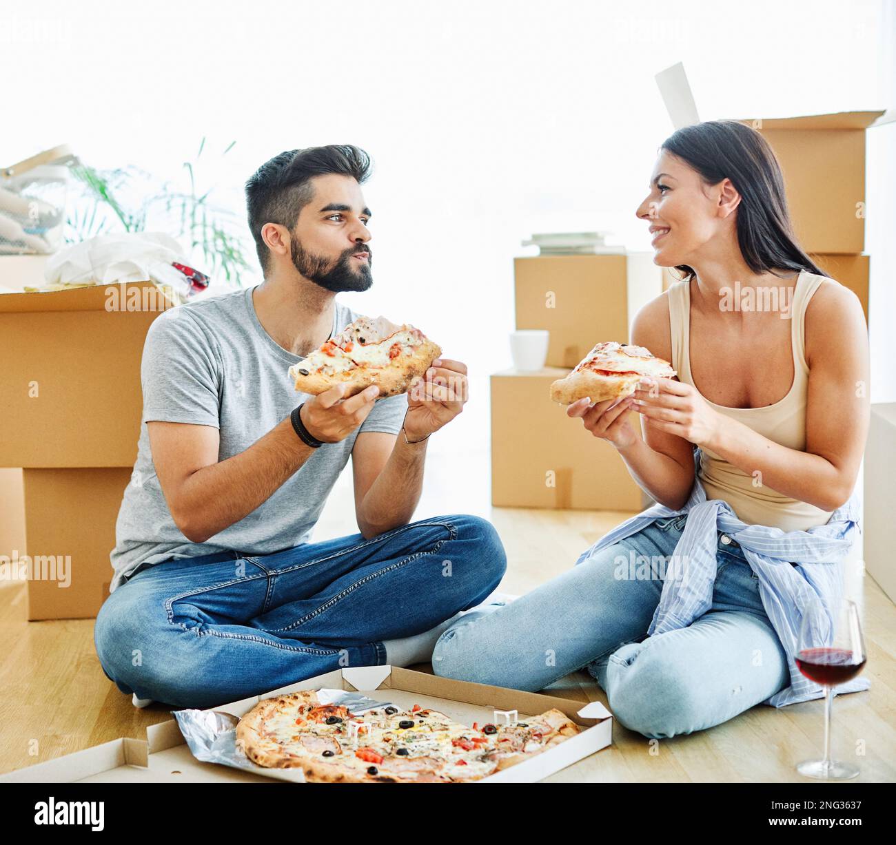 woman couple man box home house moving happy apartment together ...