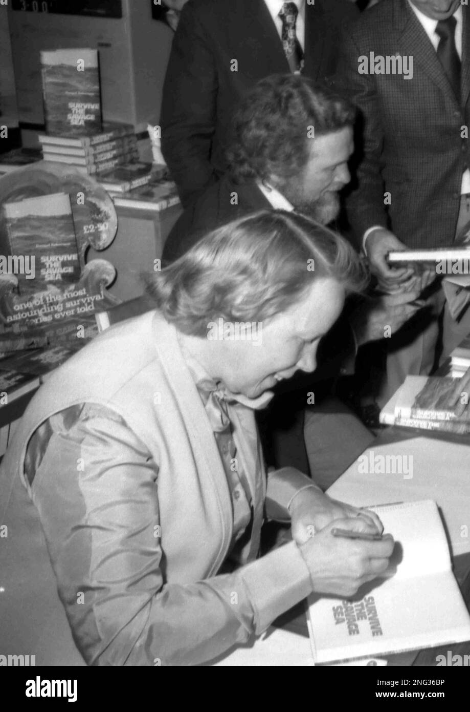 Dougal and Linda Robertson autograph copies of his book "Survive the ...