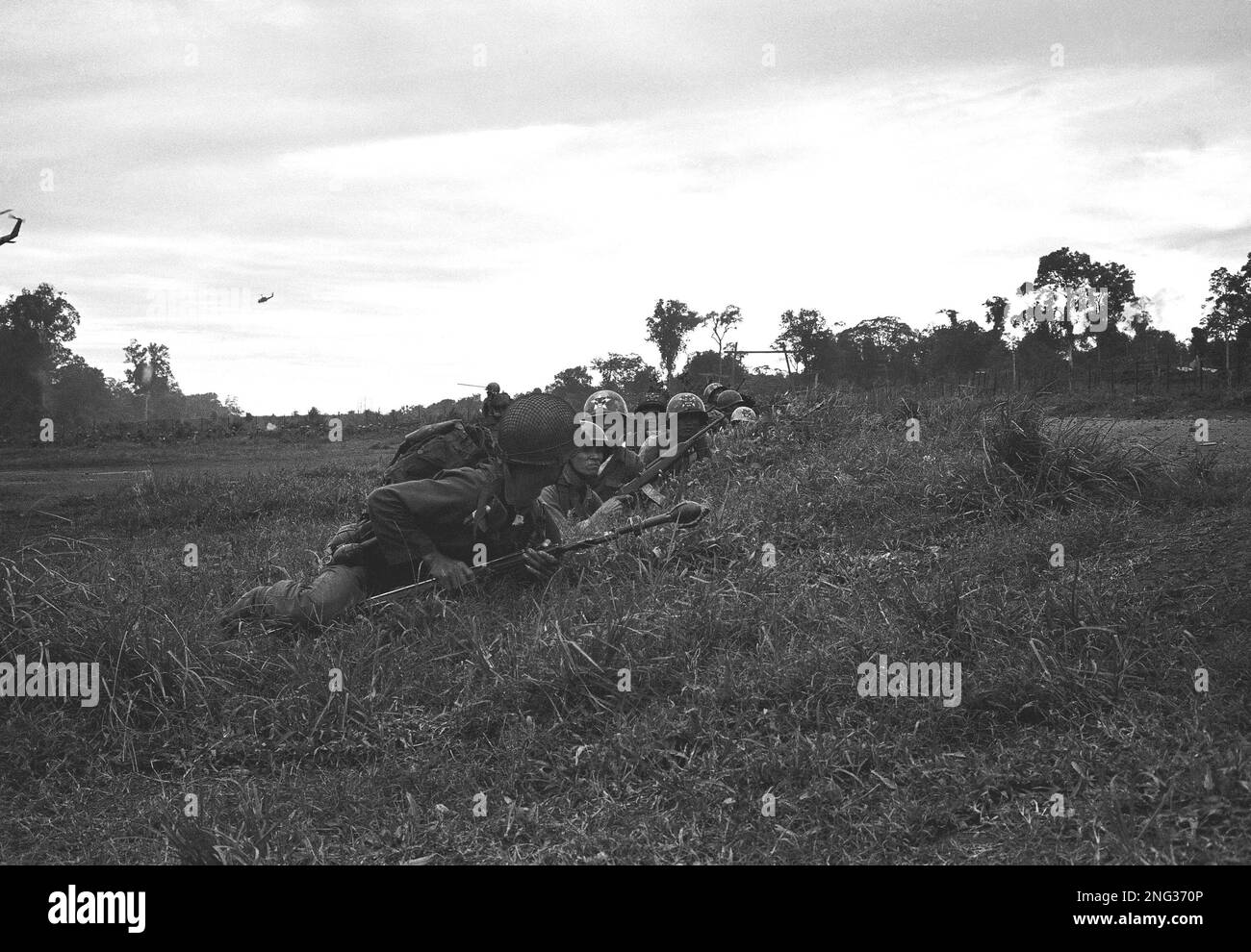 Vietnamese Rangers race toward Viet Cong positions during battle for ...