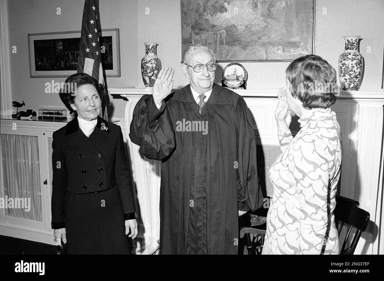 Governor Ella T. Grasso, right, swores in Max H. Reicher, center, in as ...