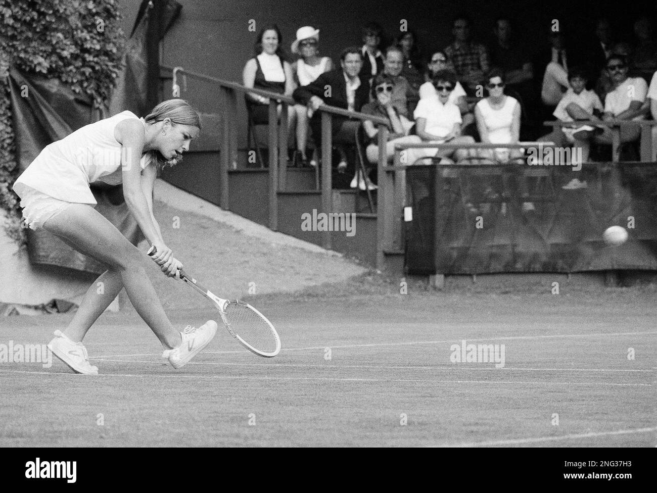 Teenage marvel, Chris Evert of Fort Lauderdale, Fla., puts gusto into a ...