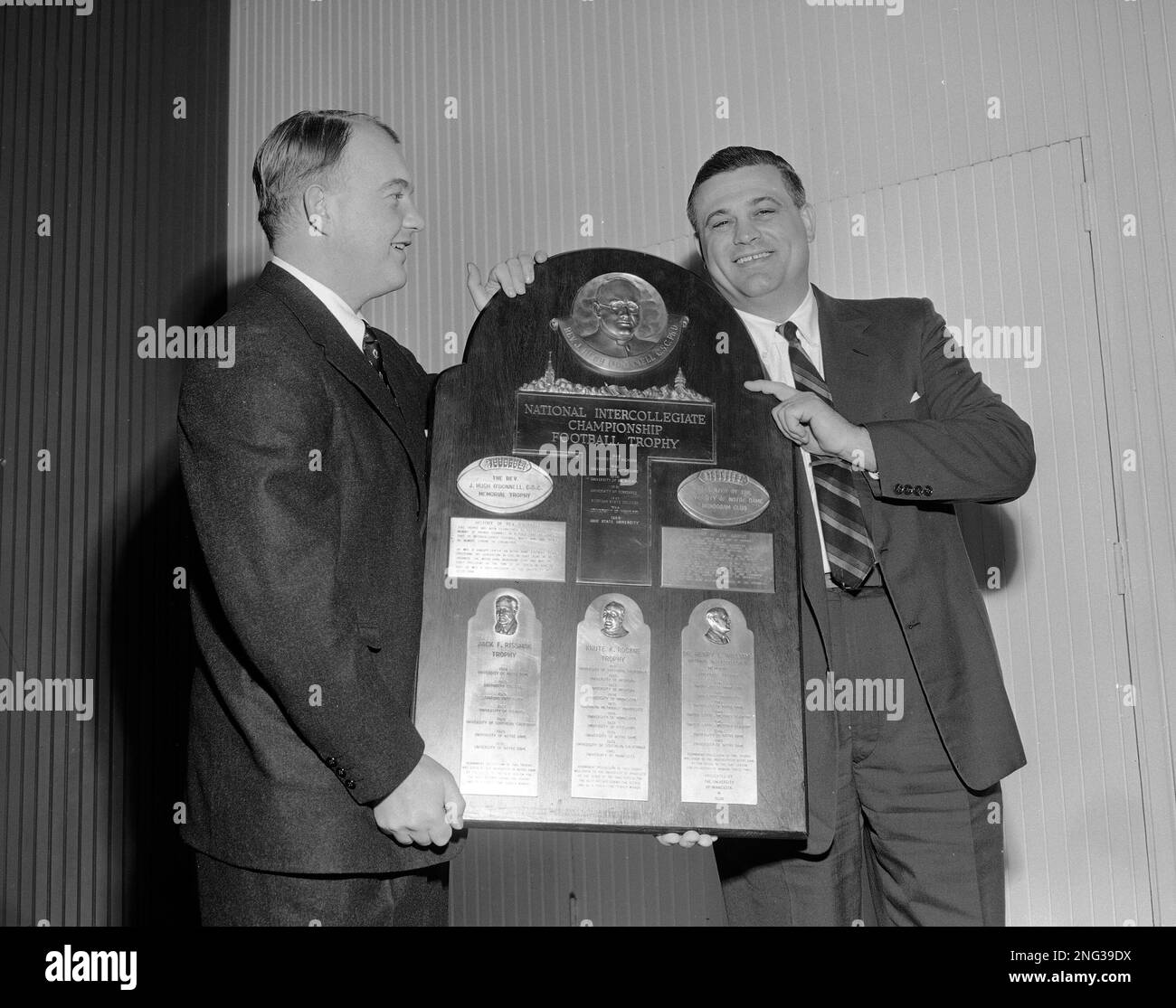 Woody Hayes, Ohio state University football coach, receives the Rev. J ...