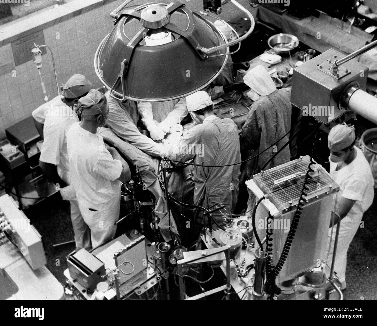 A Mayo Clinic surgical team is shown at work in St. Mary's Hospital in ...