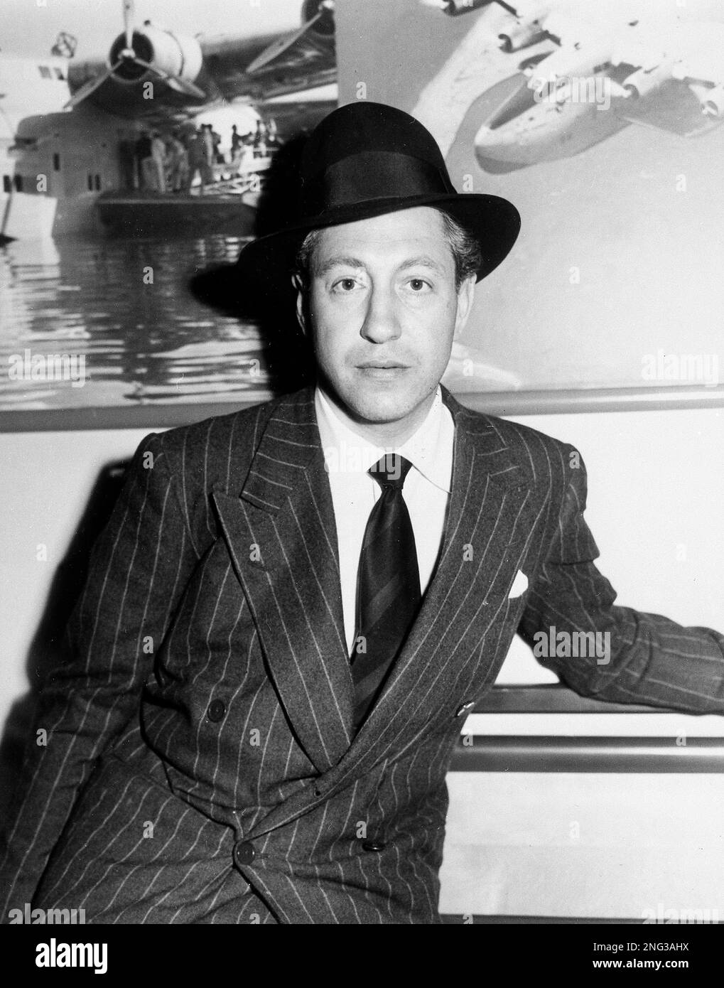 William S. Paley, president of CBS-TV is shown on arrival at LaGuardia ...