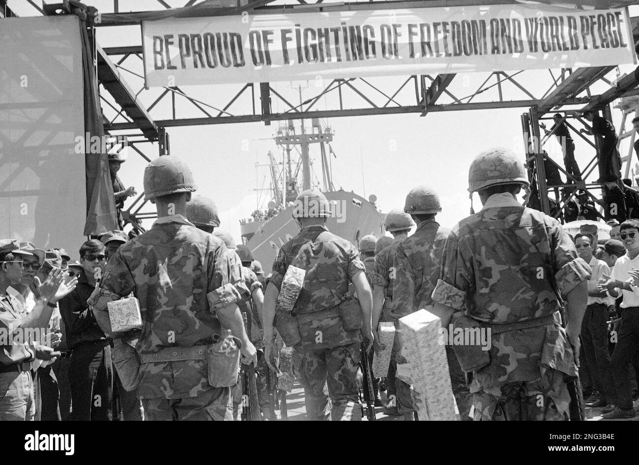 Banners of appreciation from the Vietnamese decorate the dock at Danang ...