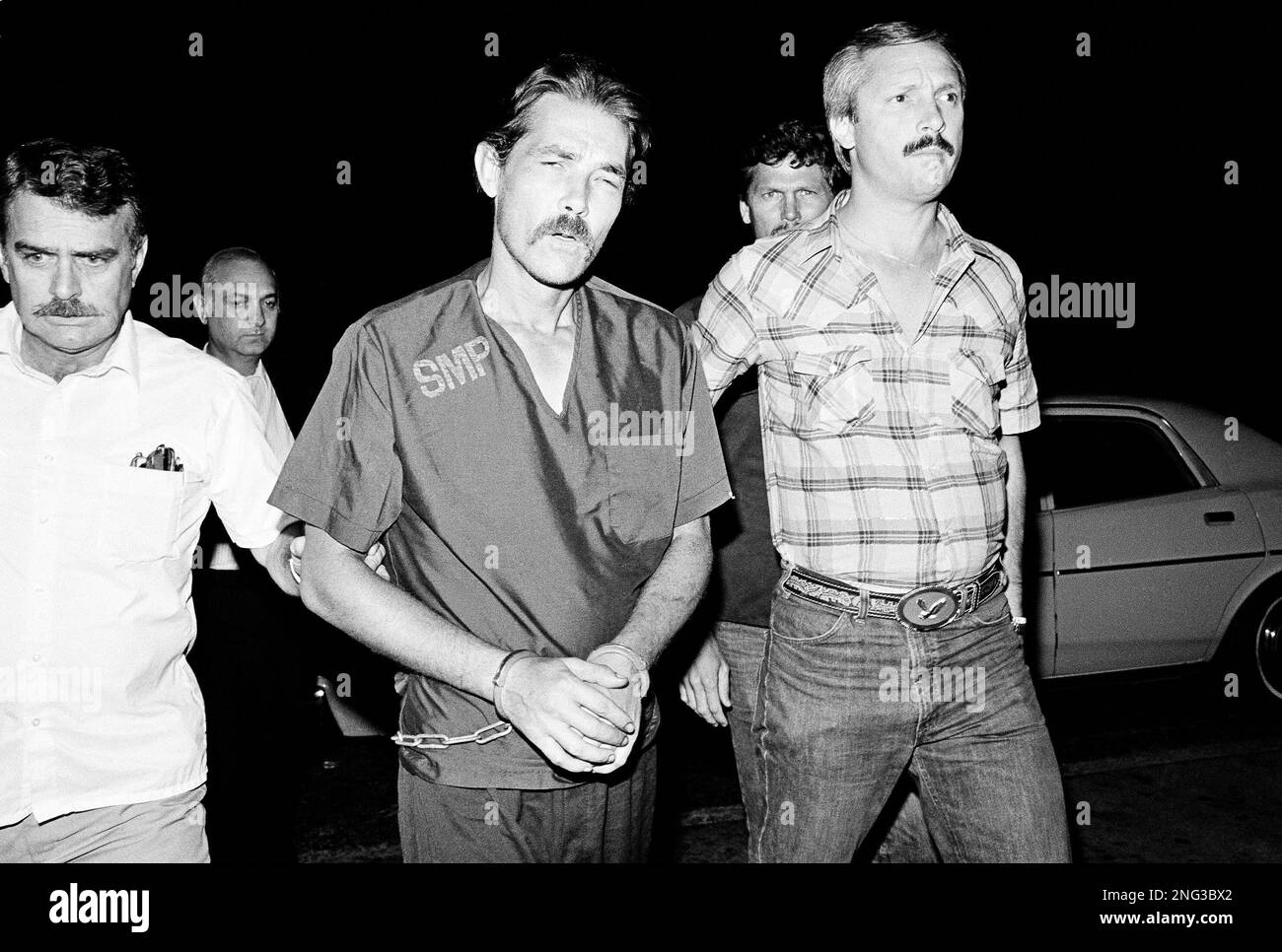 Convict-author Jack Henry Abbott walks handcuffed to jail in New ...