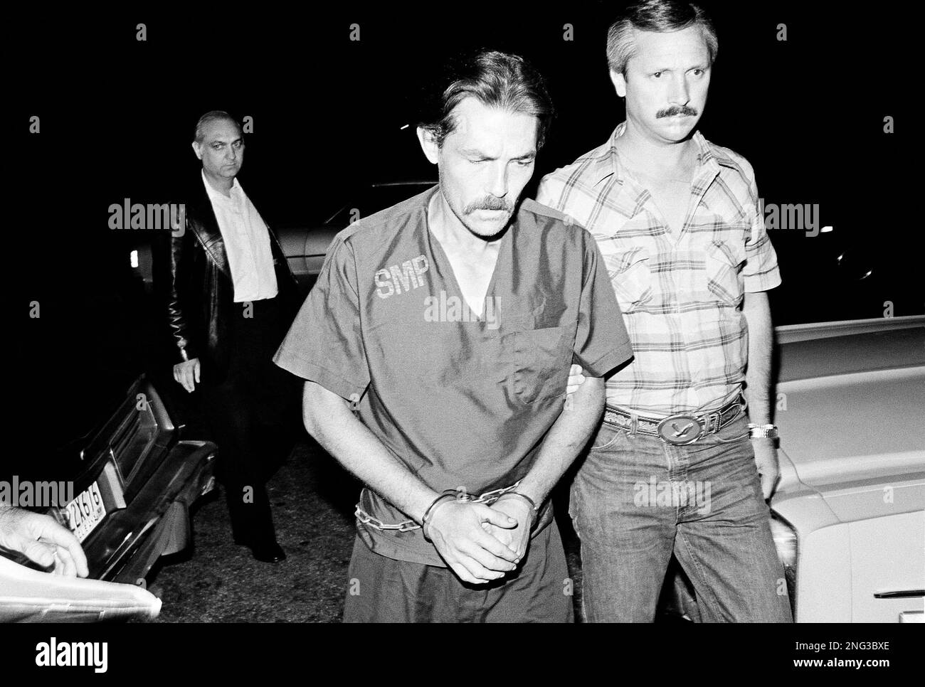 Convict-author Jack Henry Abbott walks handcuffed to jail in New ...