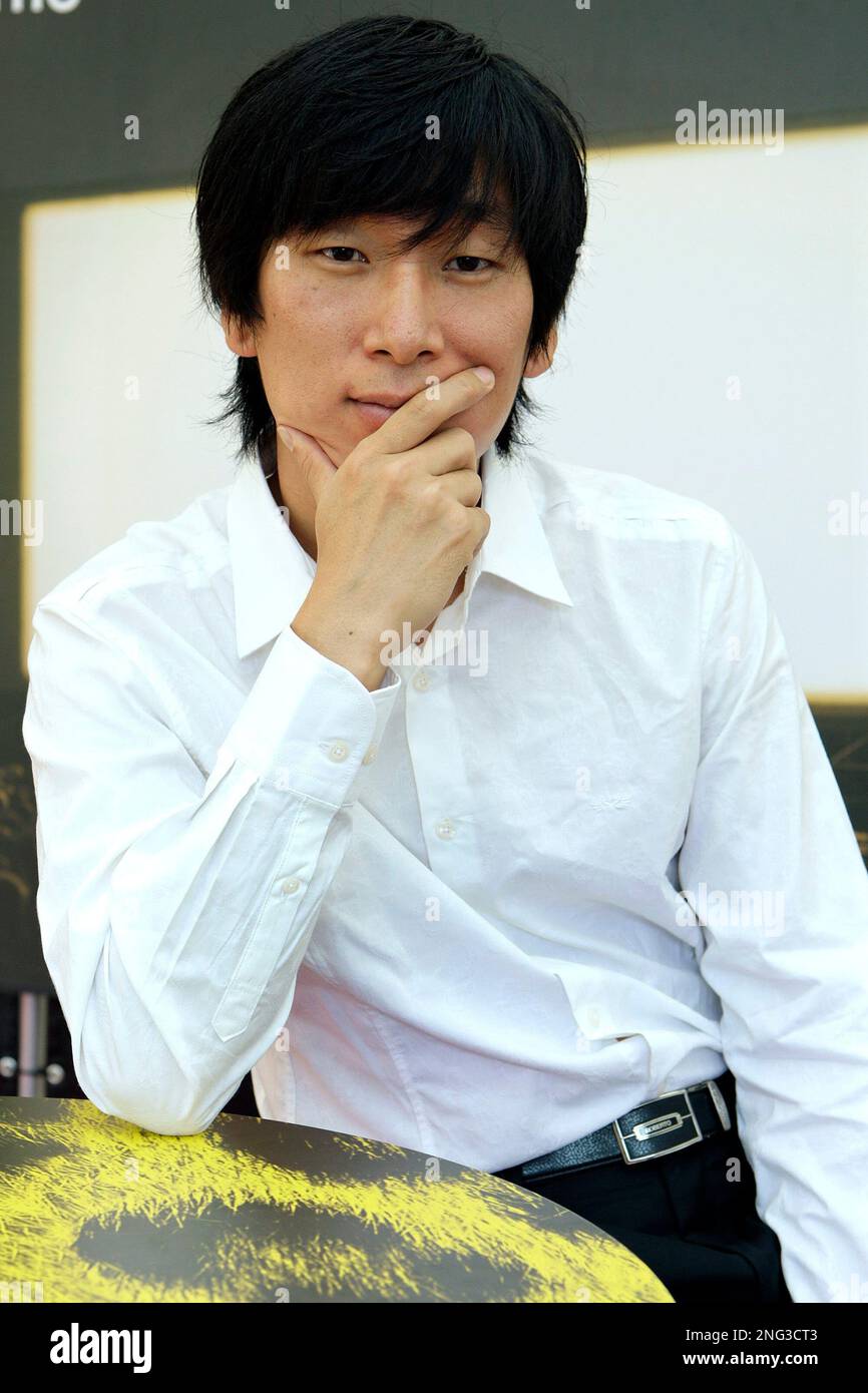 South Korean film director Hyun-woo Noh poses during a photo call prior ...