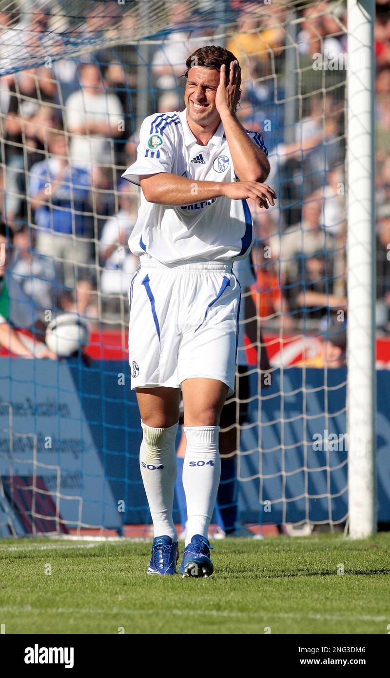 Schalke's Marcelo Bordon from Brazil reacts during German Soccer Cup ...
