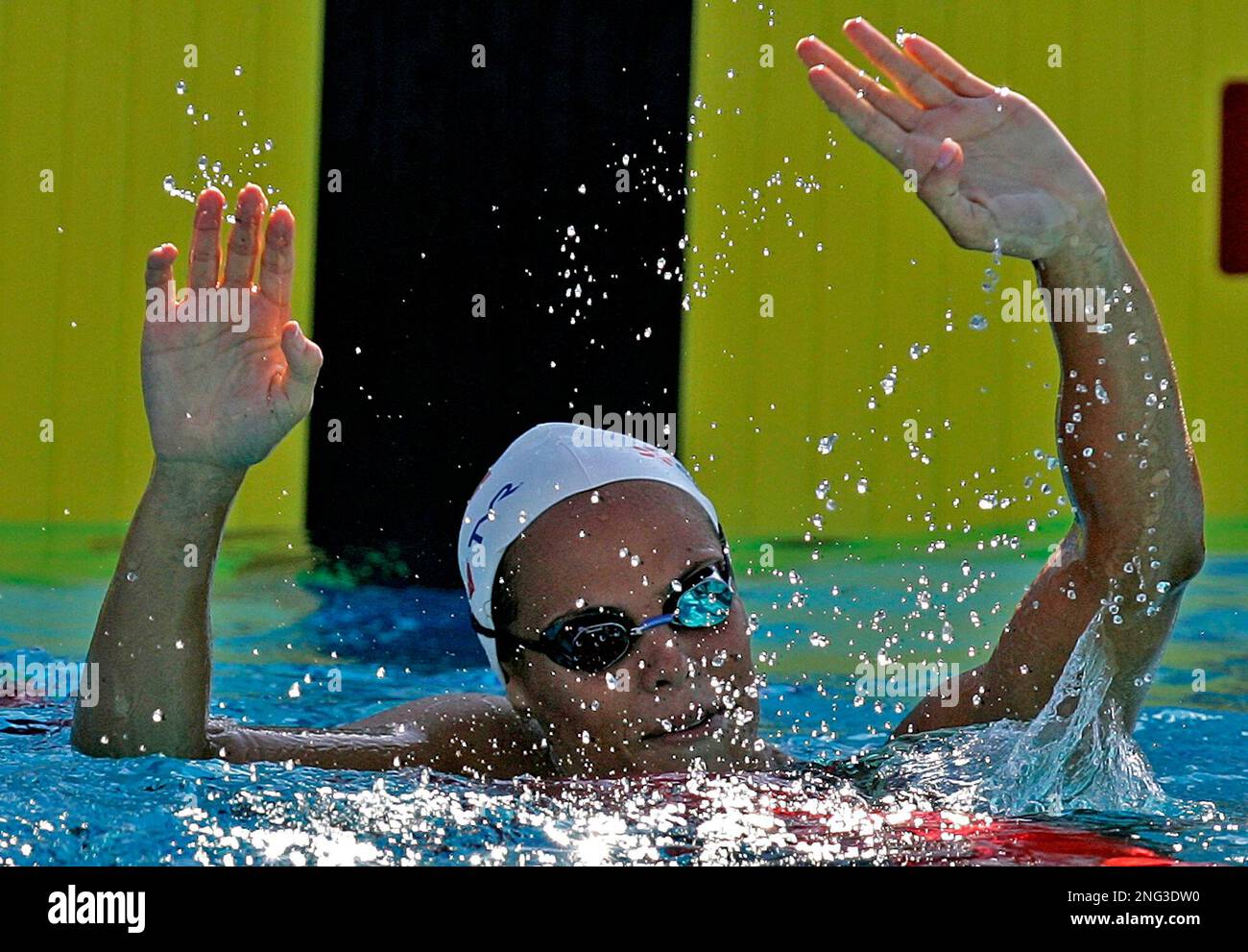 French swimmer Laure Manadouwaives to the crowd after winning the women ...