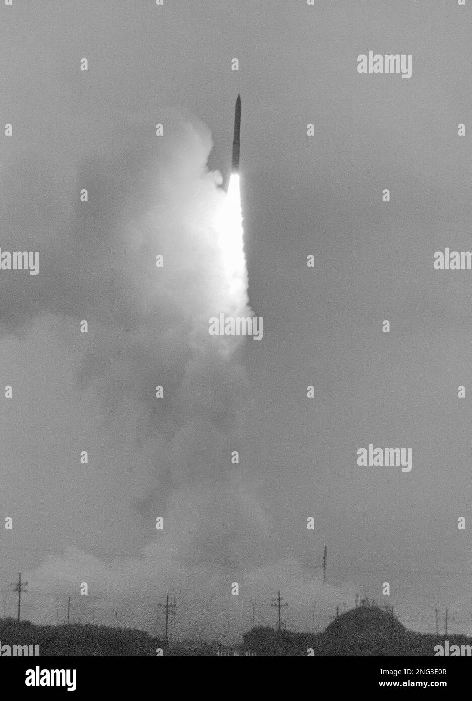 A Minuteman III missile, carrying three dummy warheads shoots up ...