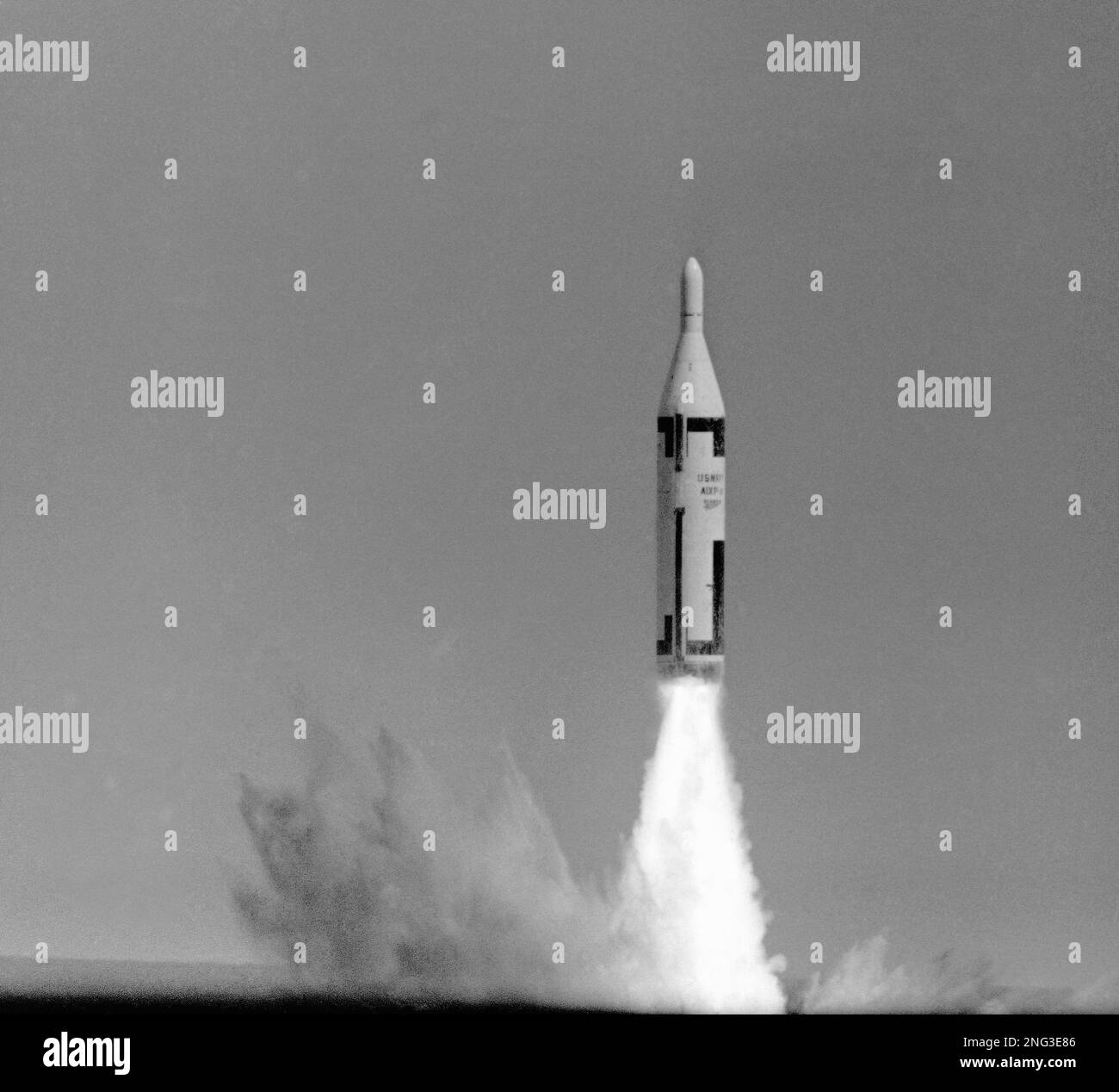 The second Polaris missile fired from a submarine clears the surface of ...