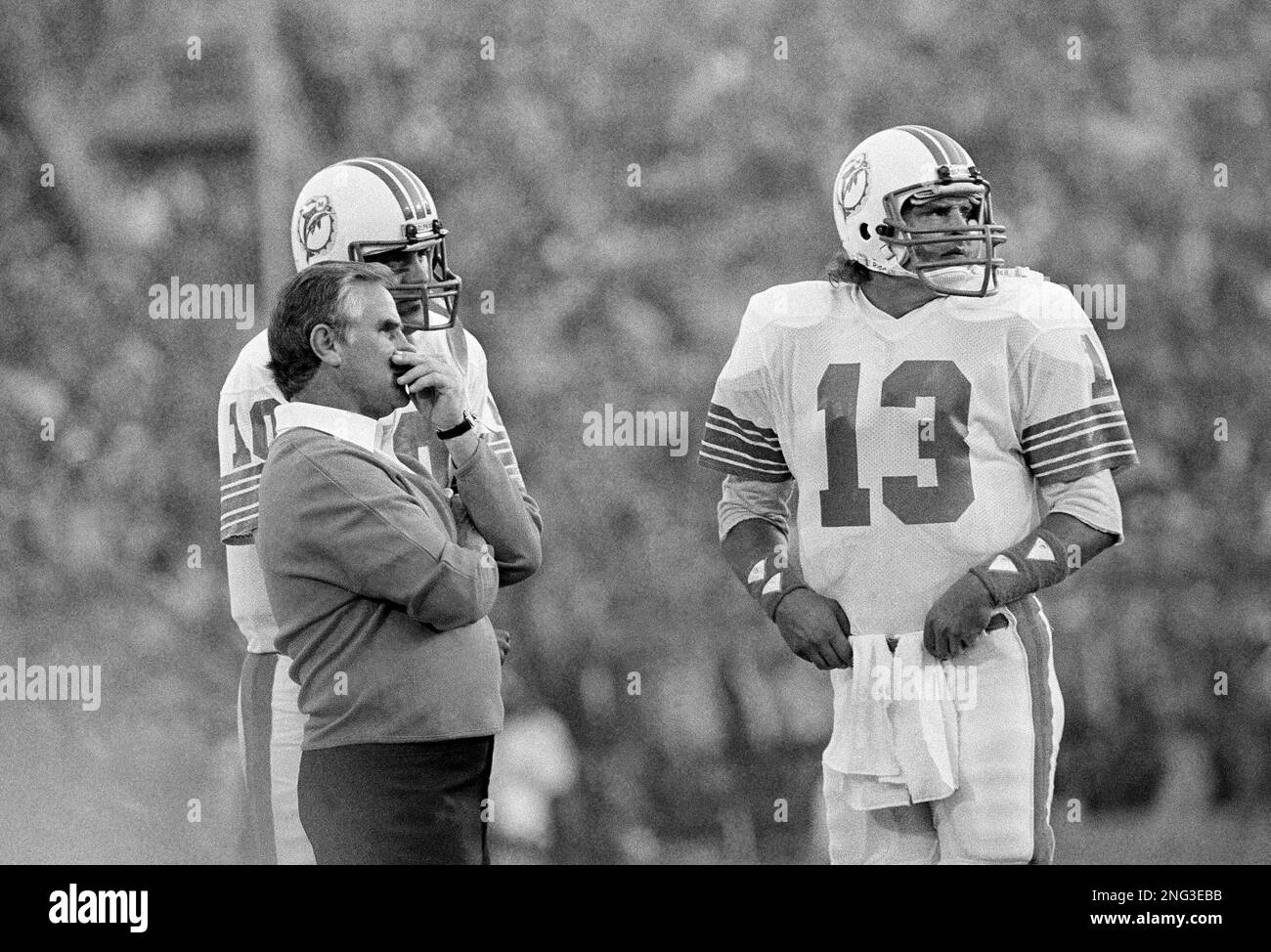 Miami Dolphins coach Don Shula discusses with quarterback Dan Marino ...