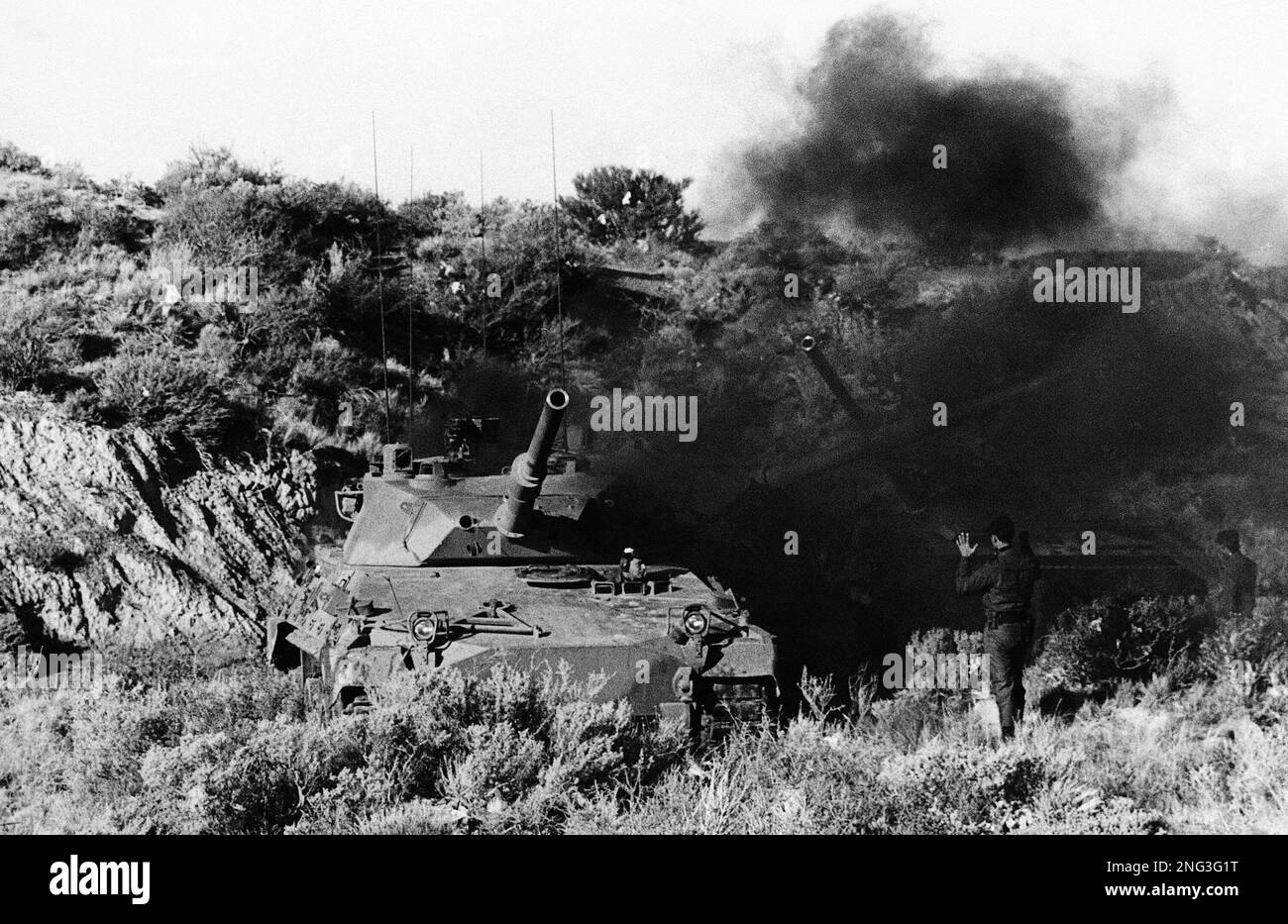 An Argentine tank moves around a protective smoke screen Tuesday, April ...
