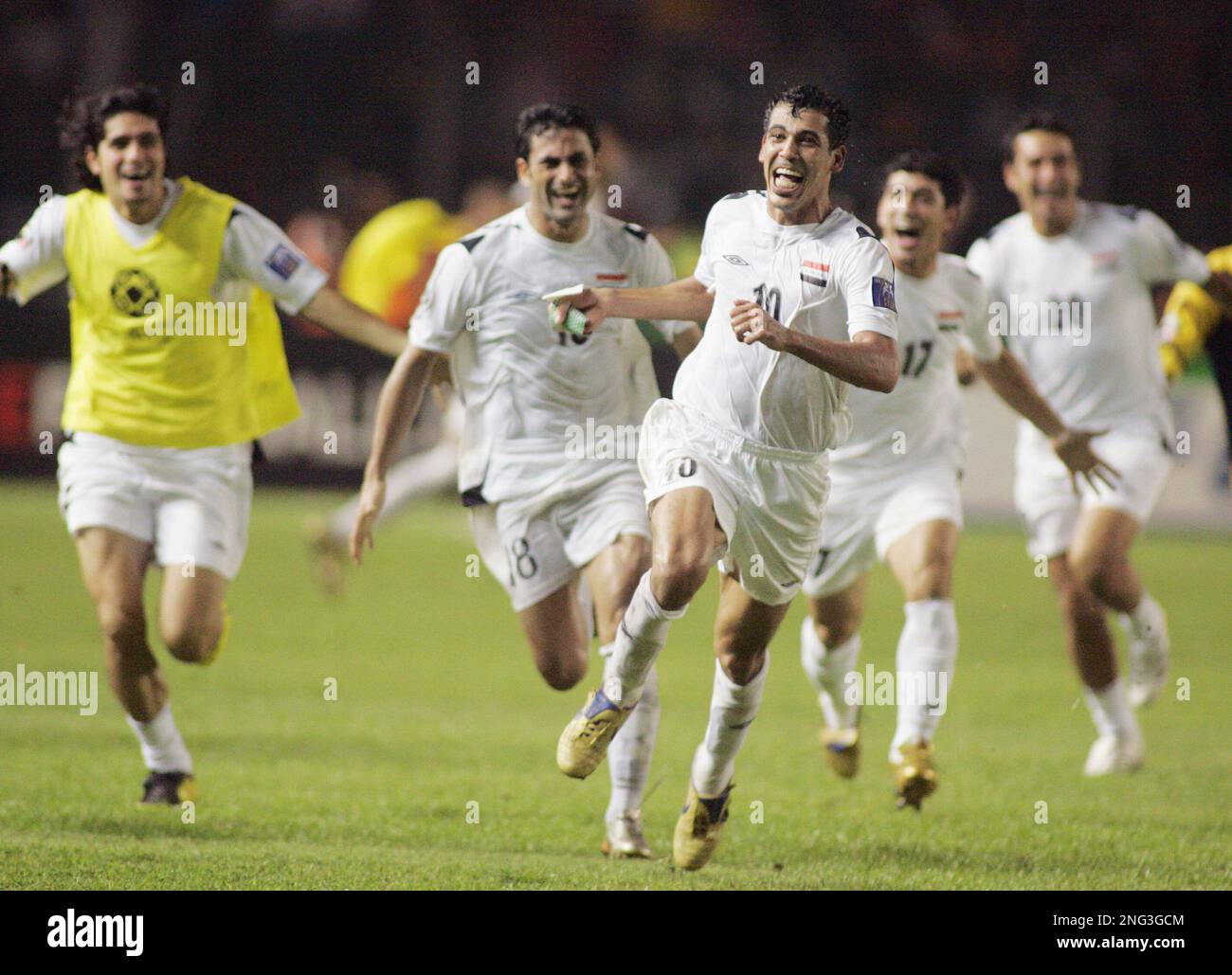 The Iraqi soccer team celebrates after winning the the AFC (Asian ...