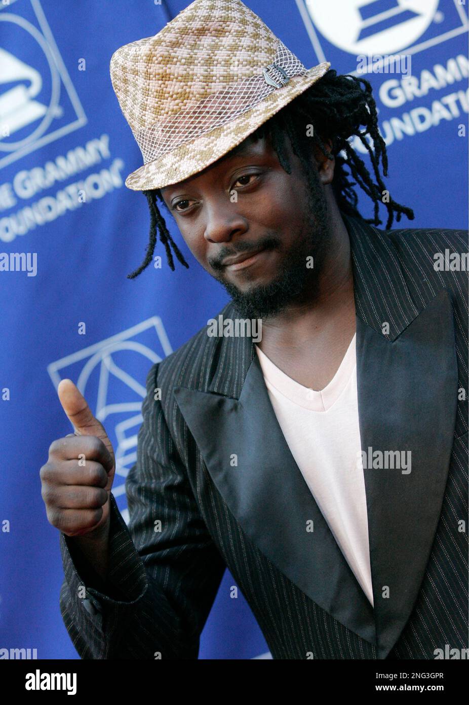 Singer Will.i.am poses on the press line at "A Starry Night" gala ...