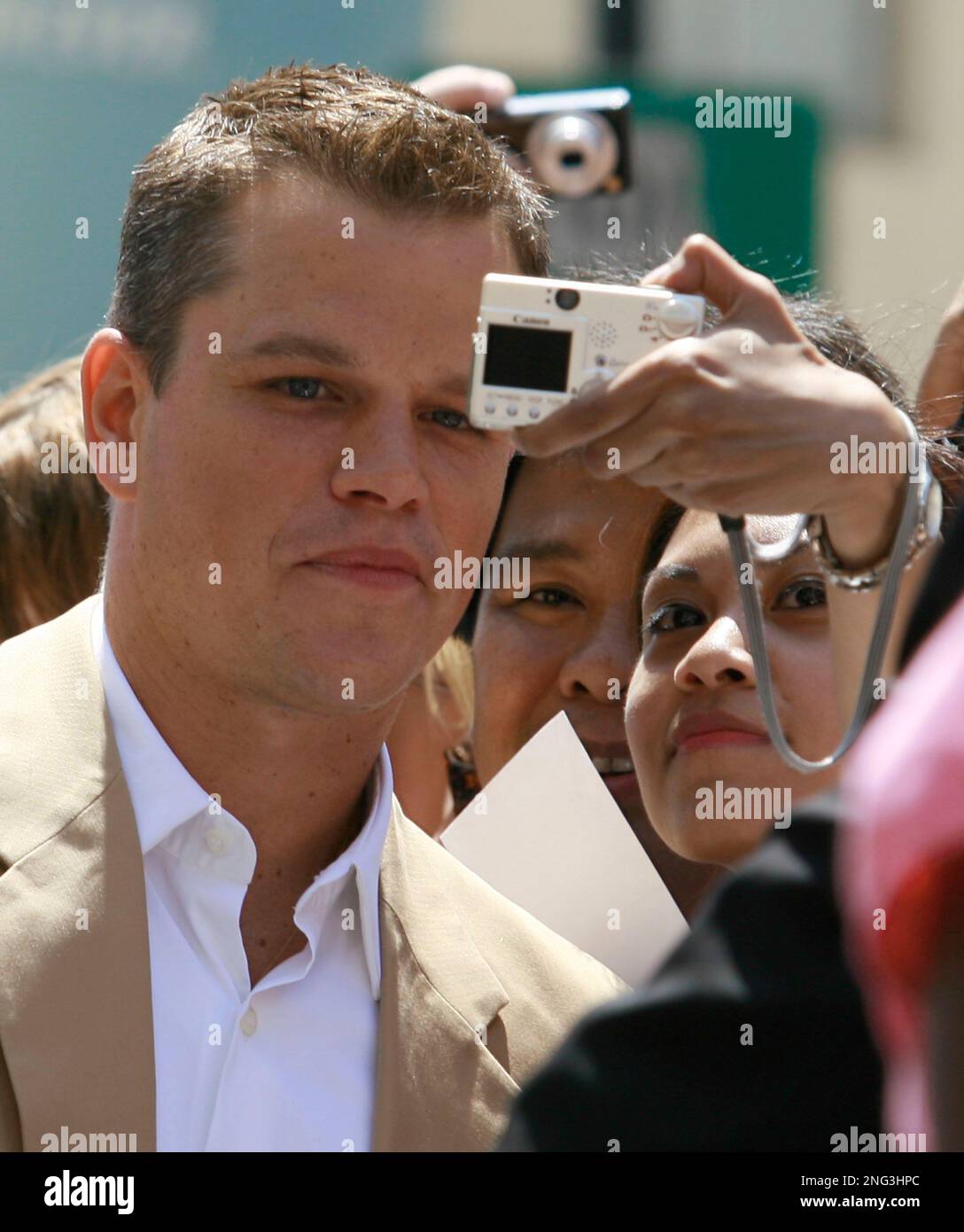 Actor Matt Damon is seen with fans before being honored with a star on ...
