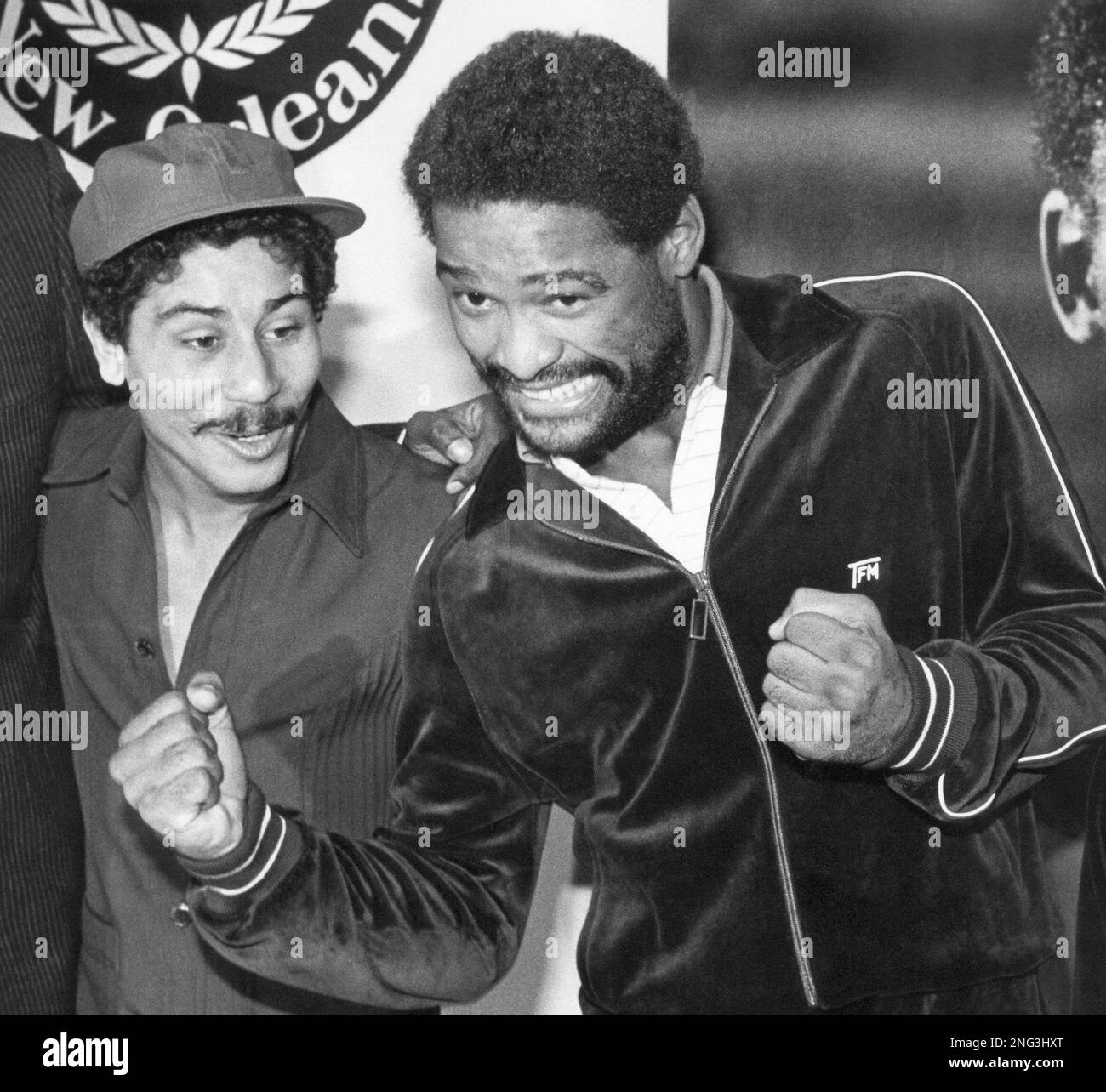WBC Super Welterweight Champion Wilfred Benitez, right, flexes his ...