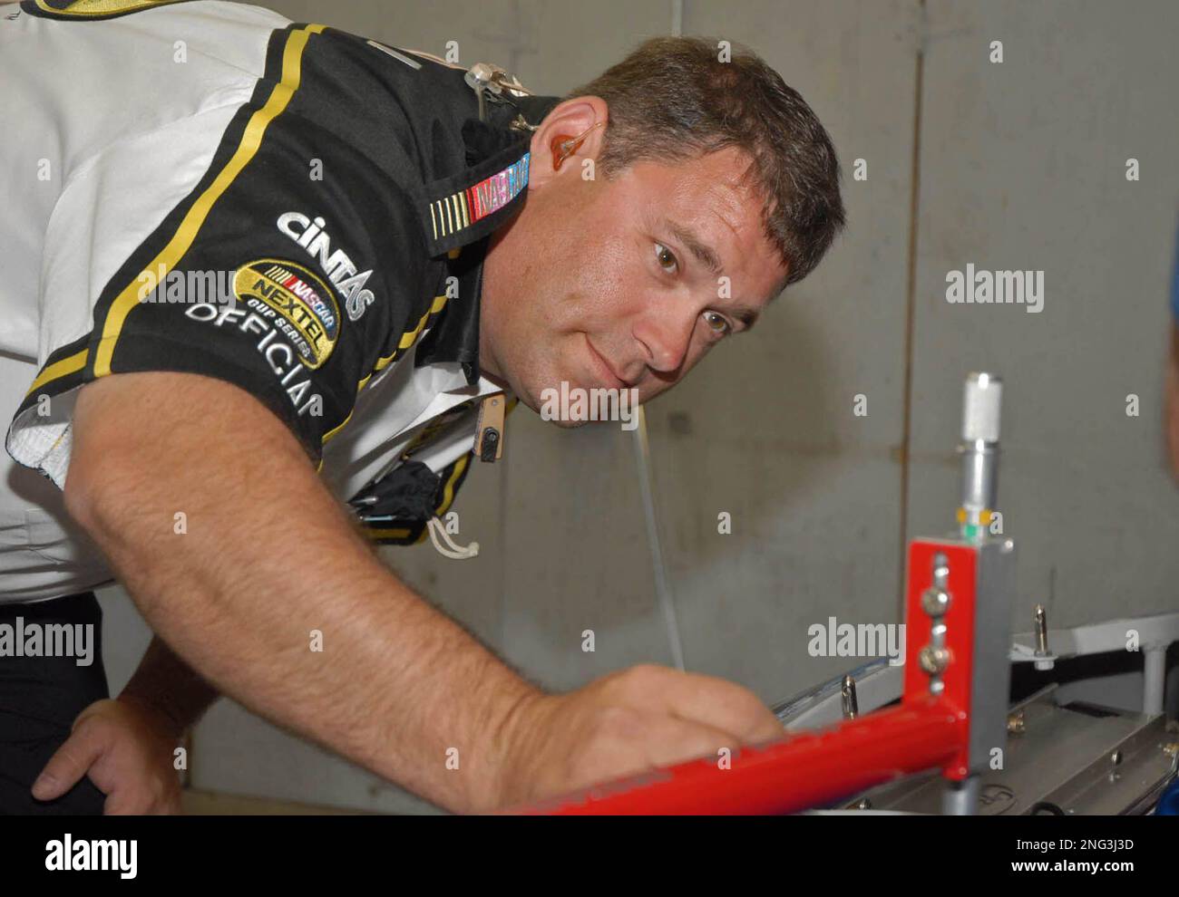 Nascar official Steve Wilt does race inspections before the LENOX ...