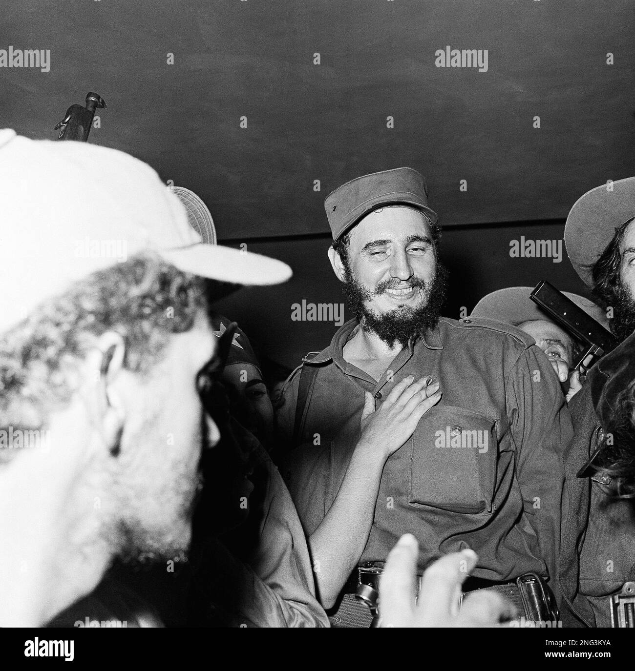 Cuban Rebel Leader Fidel Castro, on the move since 7 a.m. is a tired ...