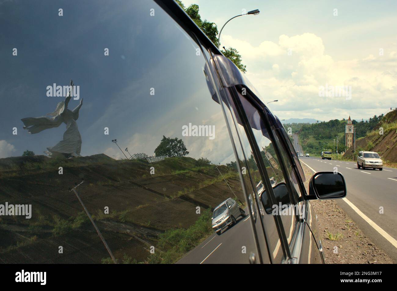 Reflection of a giant statue known as "Jesus Blessing Monument", a ...