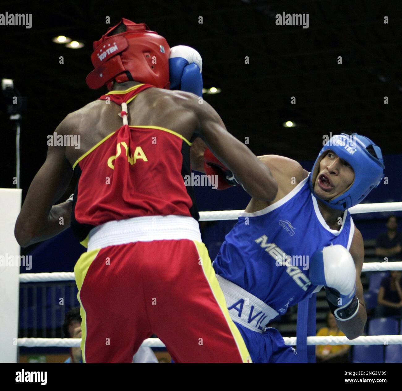 Guyana's Ryan Jeffers, left, fights with Mexico's Braulio Avila in a ...