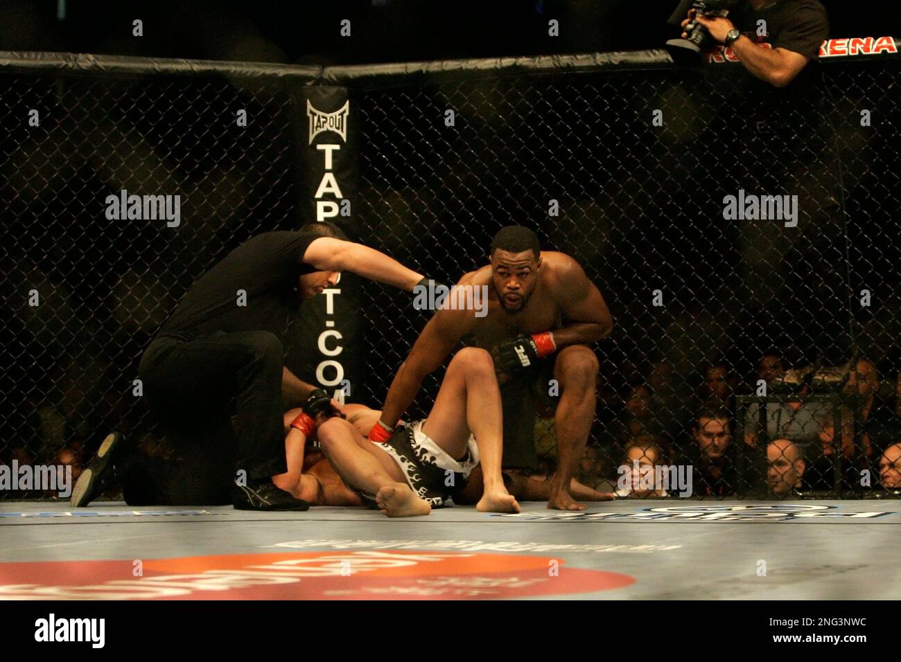 Tito Ortiz (bottom) and Rashad Evans after the final bell at Ultimate ...