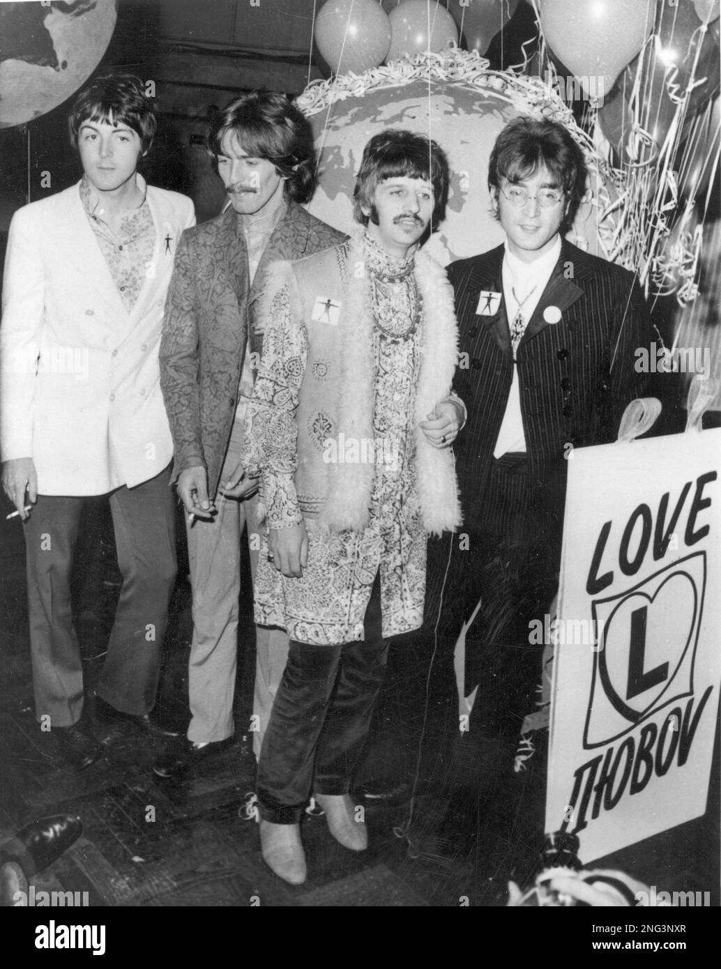 ** FILE ** The Beatles, from left, Paul McCartney, George Harrison ...