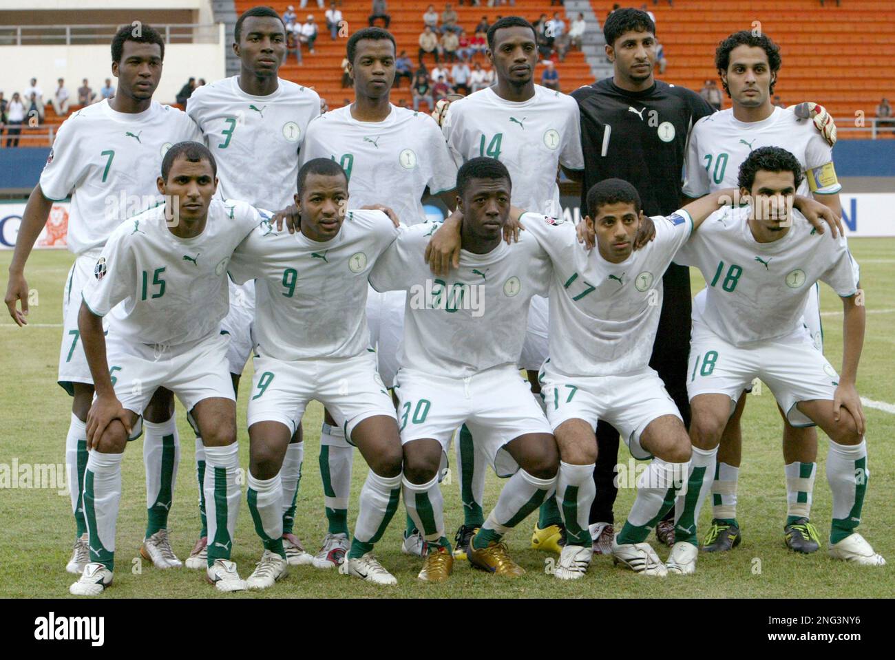 The Saudi Arabia soccer team, front left-right, Ahmed Al Bahari, Malek ...