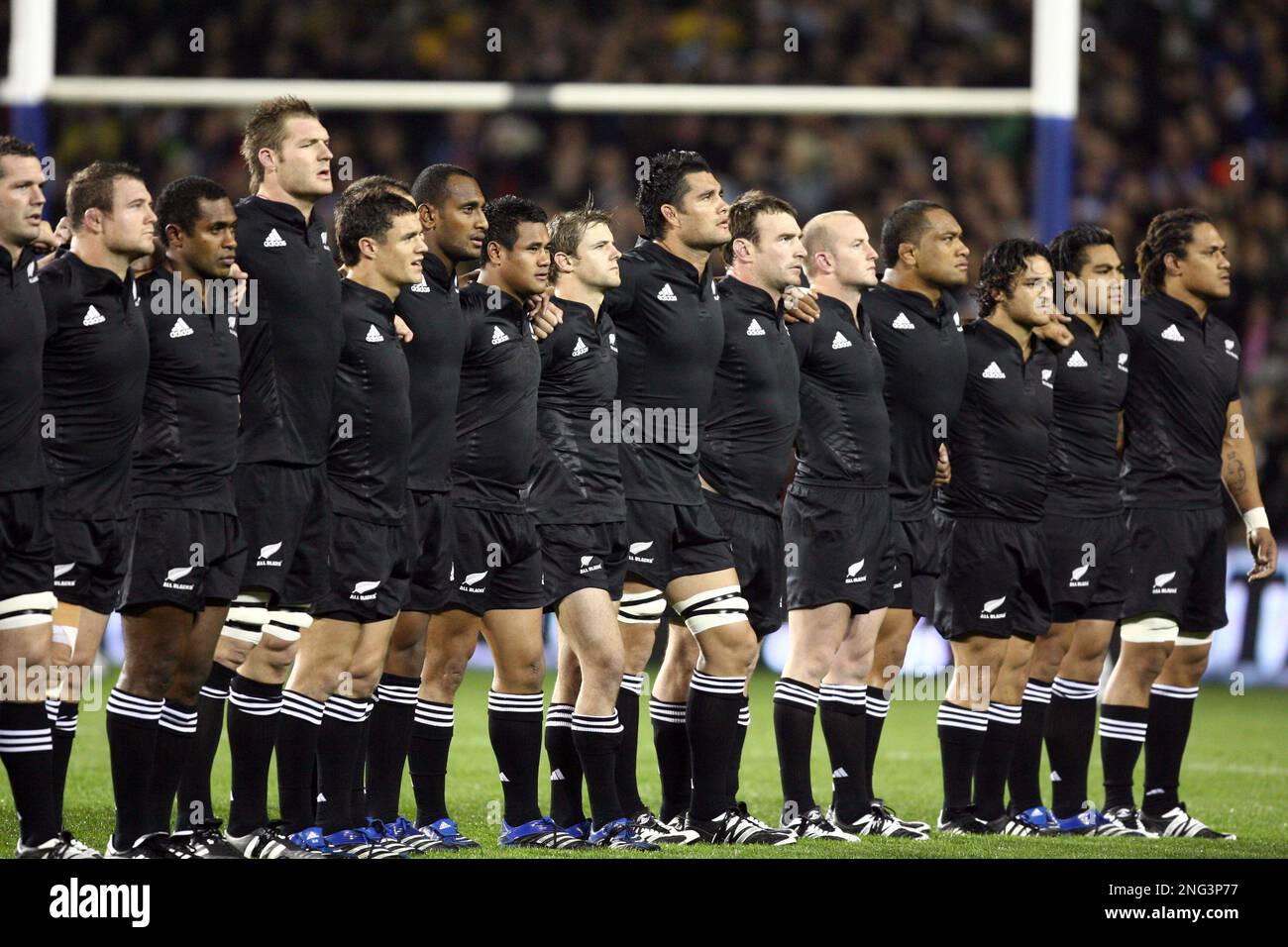 The New Zealand All Blacks line up for their national anthem before the ...