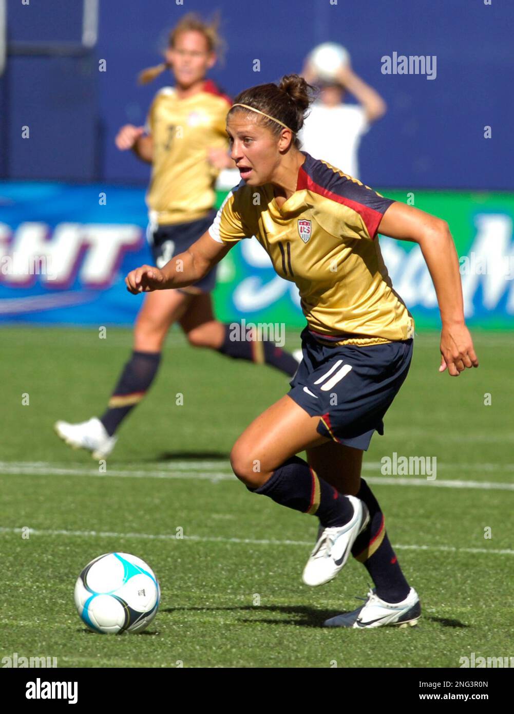 The United States' Carli Lloyd moves the ball upfield during a friendly ...