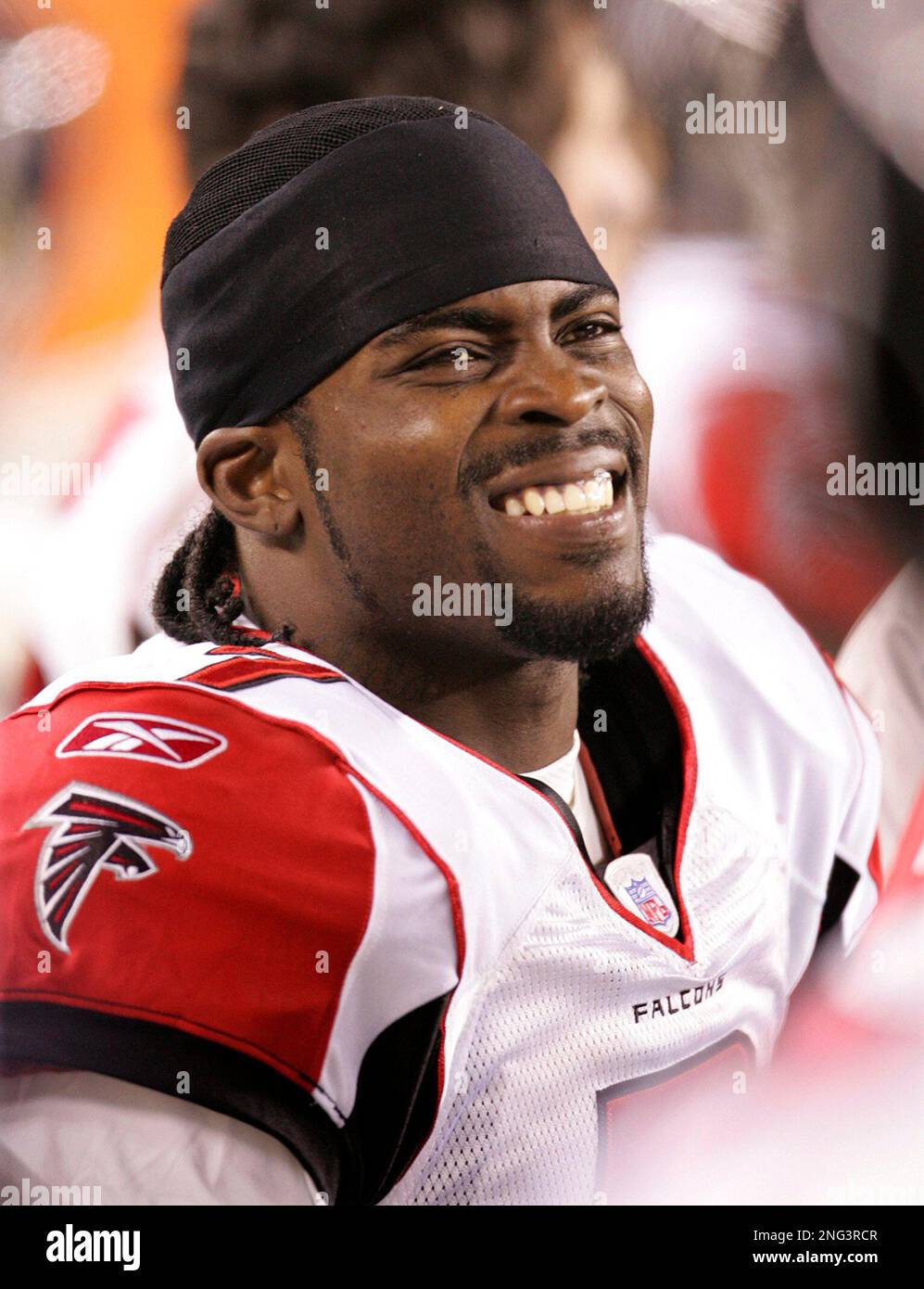 ** FILE ** Atlanta Falcons quarterback Michael Vick grimaces on the ...