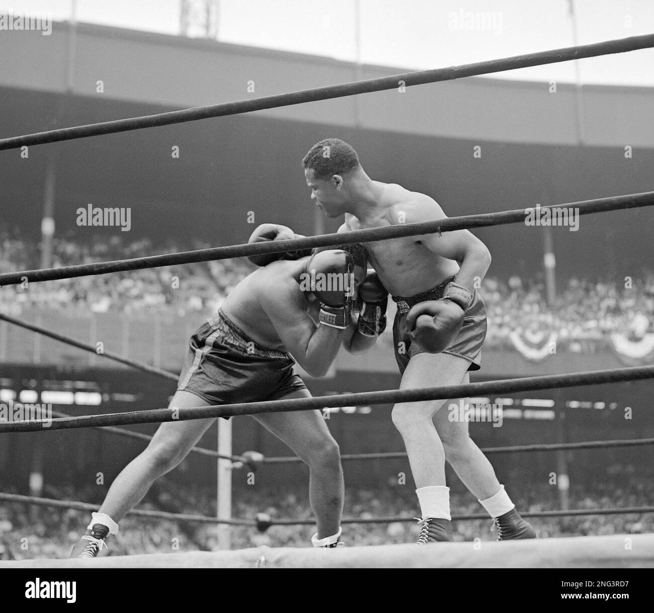 Corporal Joe Louis, world's heavyweight boxing champion, and his ...