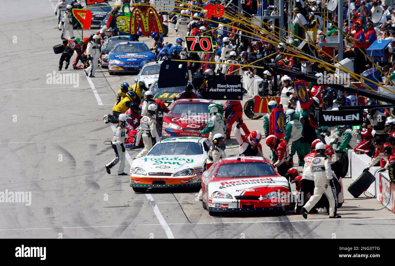 NASCAR Busch drivers make a pit stop during the NASCAR Busch Series ...