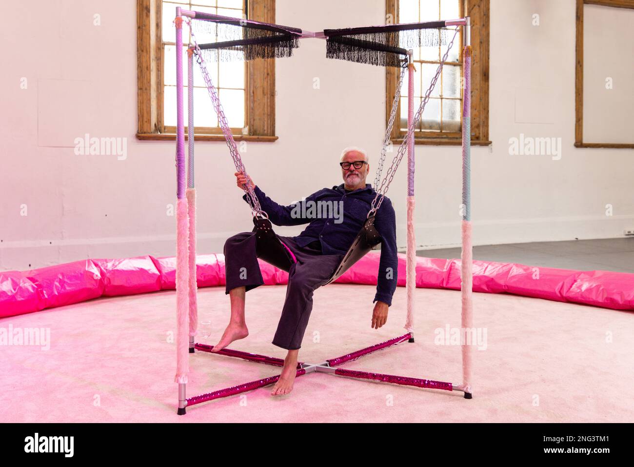 Dr Phillip Adams poses for a photograph during a media preview of ...
