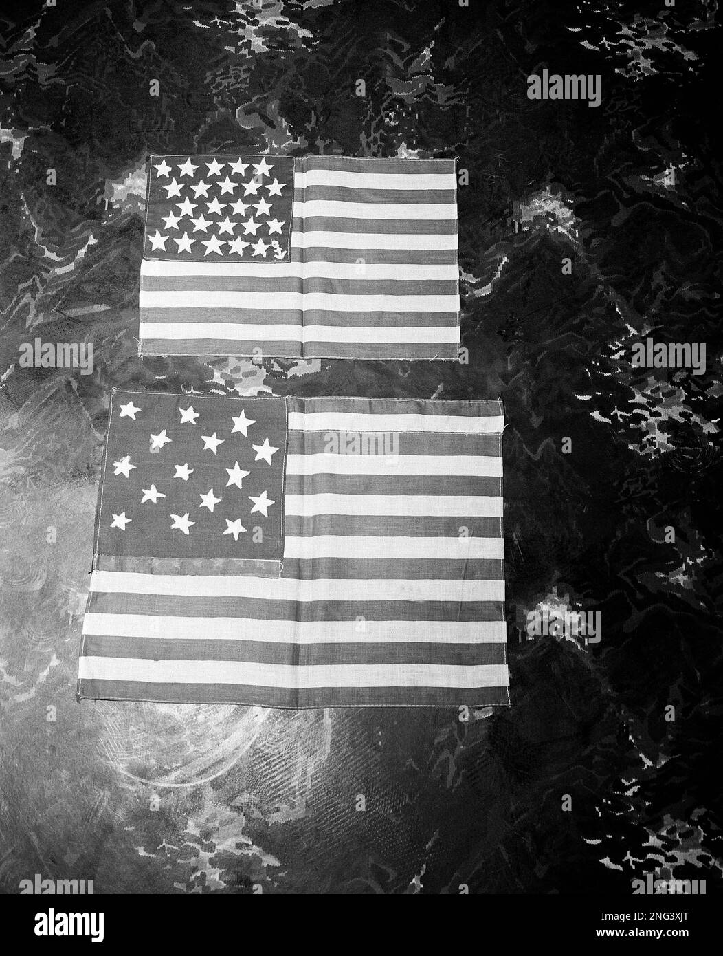 The upper flag, according to Mrs. William H. Jenkins who recreated them ...