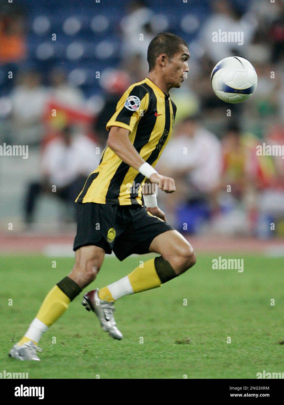 Indra Putra Mahayuddin from Malaysia keeps his eye on the ball during ...