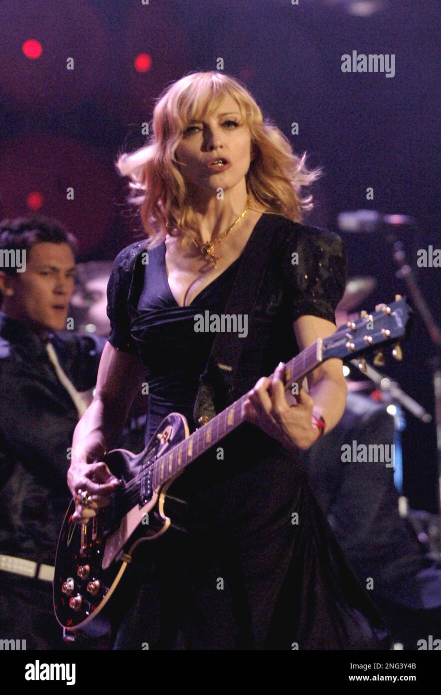 U.S. singer Madonna performs on stage during the British leg of the ...