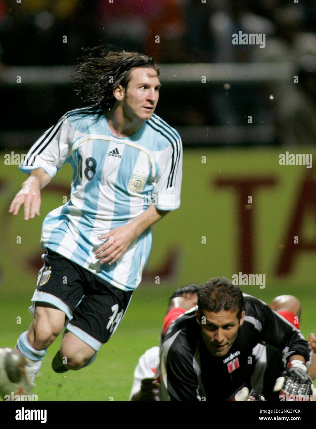 Argentina's Lionel Messi, left, celebrates after scoring during a Copa ...