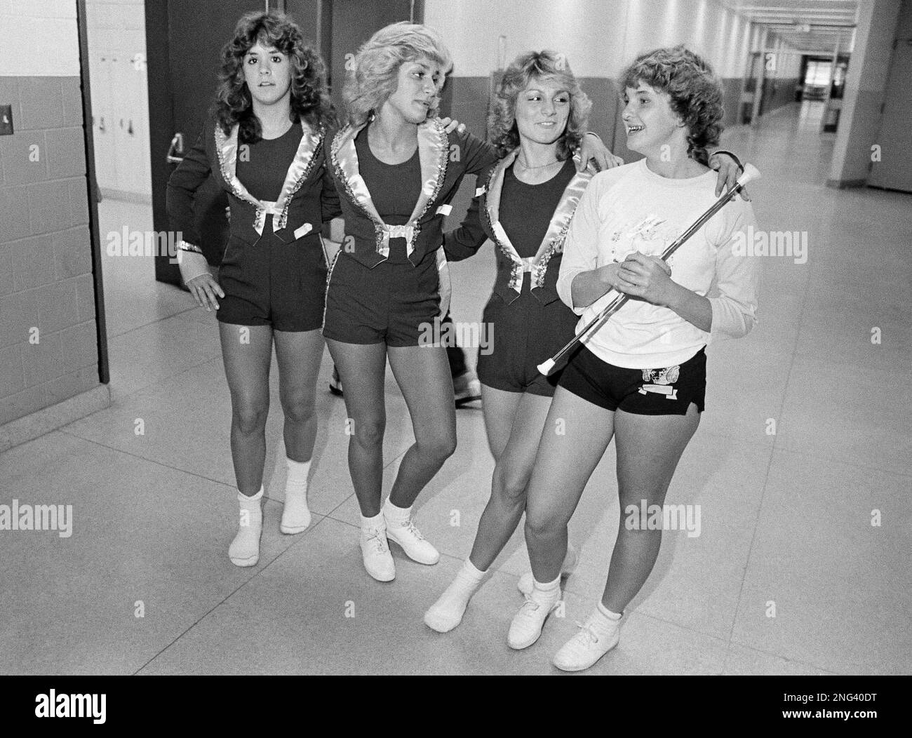 Ringgold High School majorette Peggy Ward, right, receives support from ...