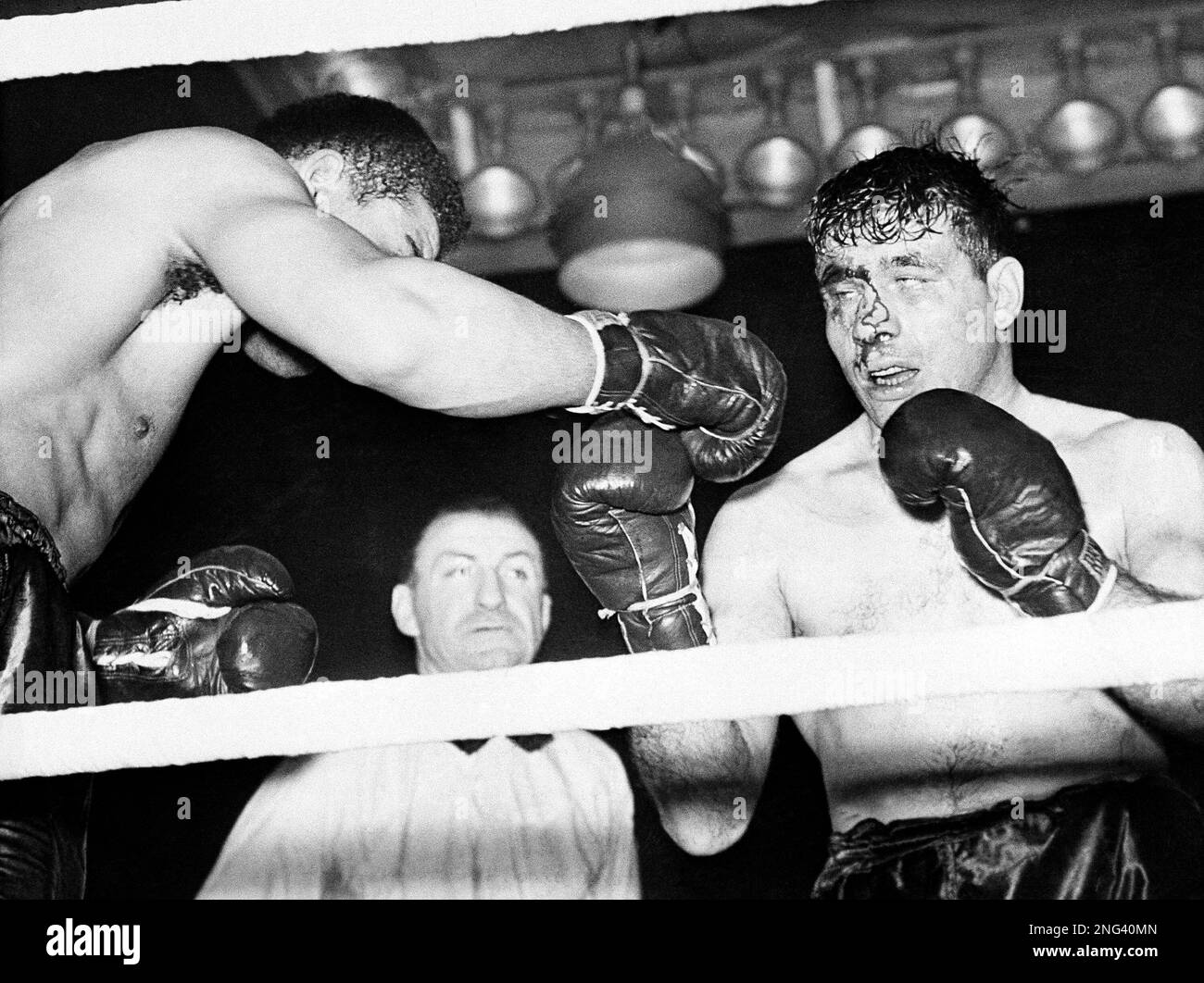 Blood flowed as Tony Musto, the Chicago challenger, was battered by Joe Louis April 8, 1941 in ...