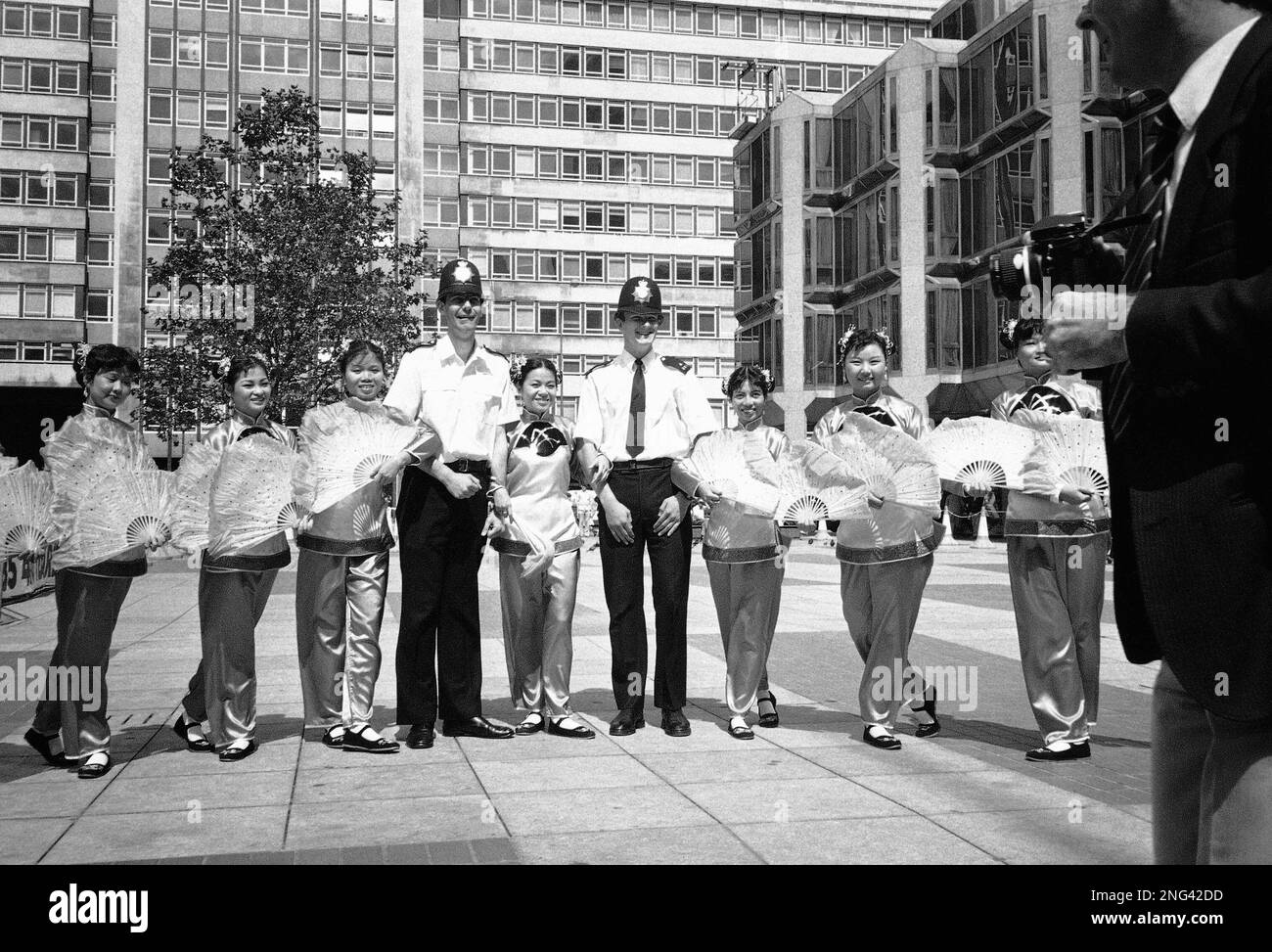 Members of the Royal Hong Kong Police force Chinese ribbon dance team ...