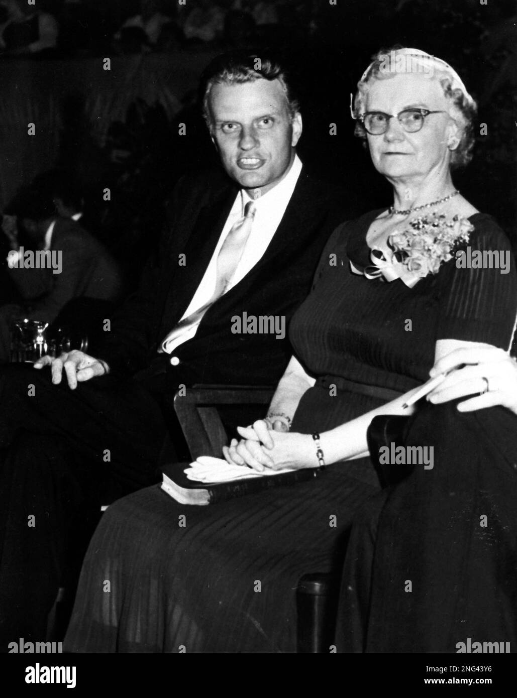 The Rev. Billy Graham sits with his mother Anne Morrow Graham at ...