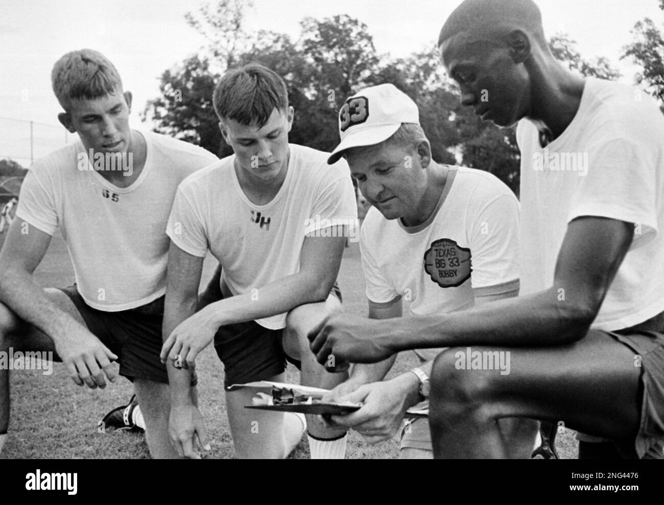 University of Texas' Big 33 head coach Bobby Layne, second from right ...